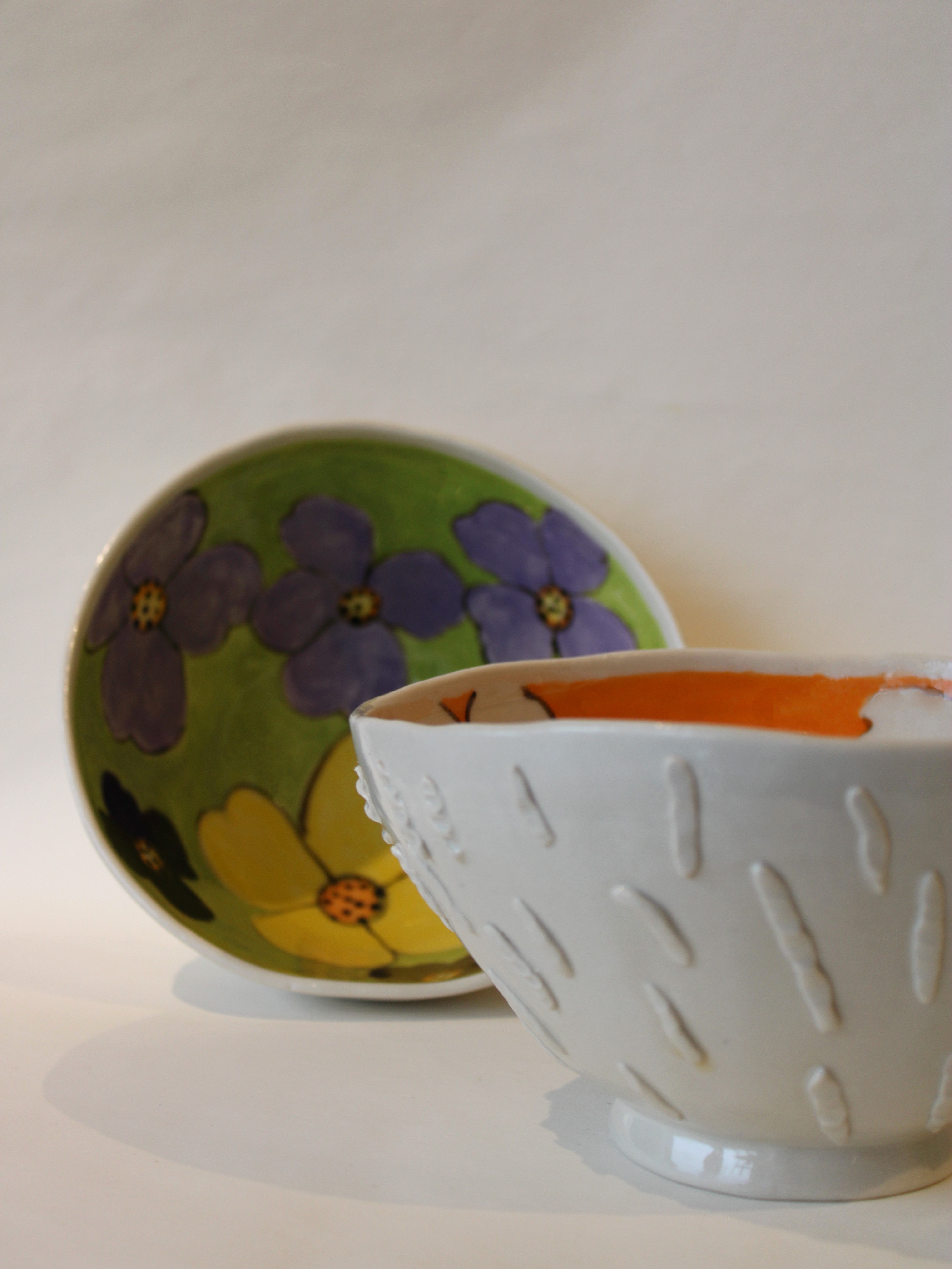 White Porcelain Bowl With Textured Exterior And Orange Inside With Whi ...